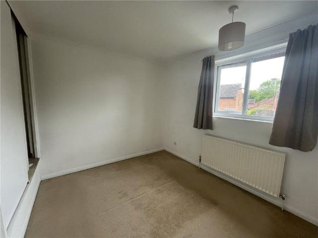 An end terrace one bedroom house with enclosed garden and driveway parking situated within walking distance from the popular Marlborough High Street