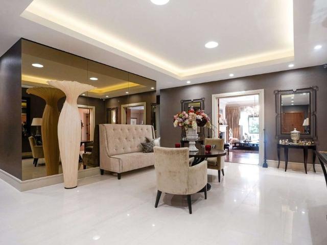 An exceptional 4,126 sq ft three bedroom apartment, swimming pool, and a spectacular wrap around terrace with garden, set within an exclusive residential development