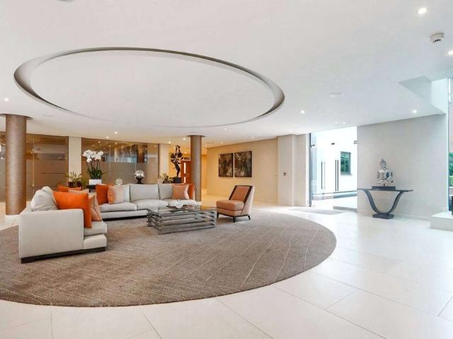 An exceptional 4,126 sq ft three bedroom apartment, swimming pool, and a spectacular wrap around terrace with garden, set within an exclusive residential development