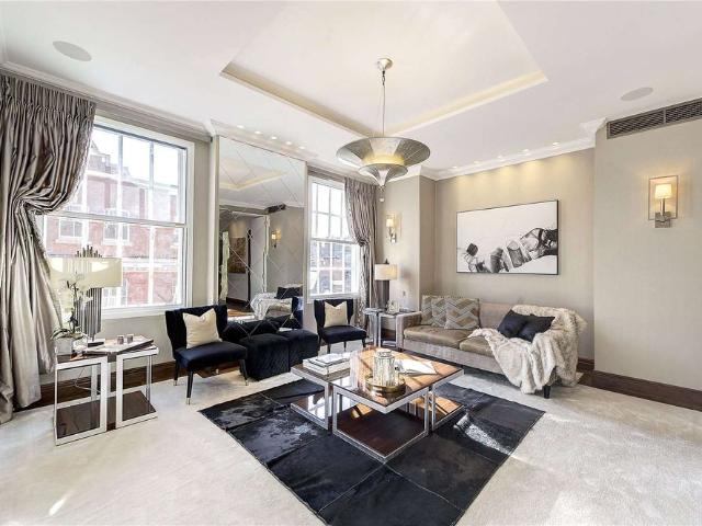 An exceptional and beautifully designed two bedroom Mayfair apartment with lift access and 24 hour porter