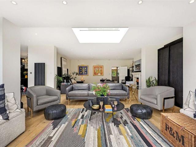 An exceptional five bedroom family home showcasing superb lateral space, refined finishes and generous private garden