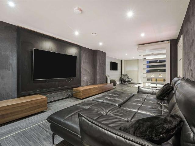 An exceptional gated residence extending to approximately 6,500 sq ft, set on one of Bramhall’s most prestigious addresses