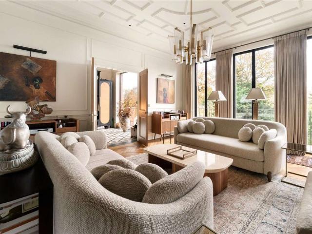 An exceptional, newly refurbished family home on a prime road in Hampstead village