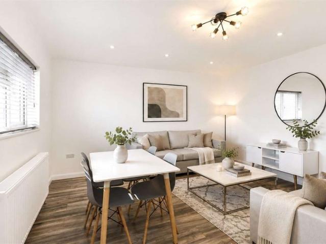An exceptional refurbished two bedroom, two bathroom maisonette with off street parking