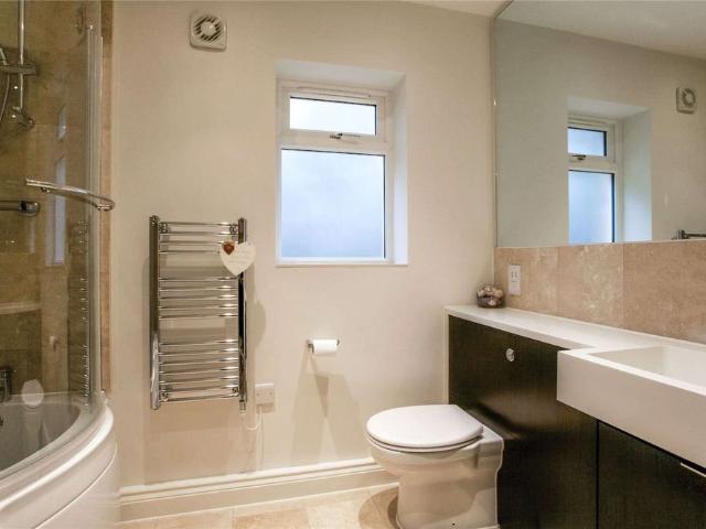 An executive two bedroom apartment on the ground floor of this sought after development near the town centre