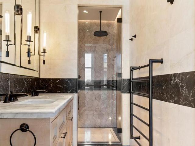 An exquisite, newly refurbished fifth floor lateral apartment situated moments from Kensington Gardens