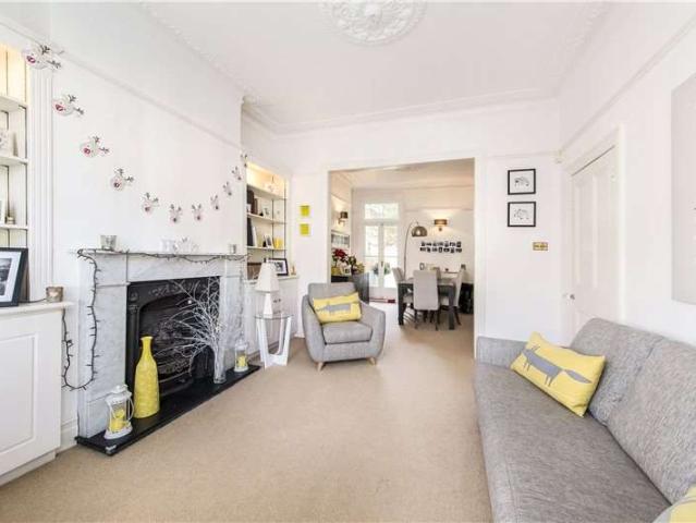 An immaculate, four bedroom house with a garden situated in a popular residential road in Wandsworth