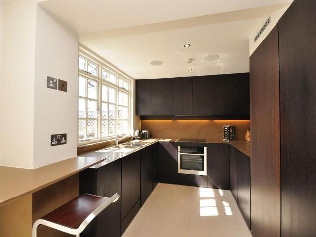 An impeccably, interior designed apartment with a garage and private garden