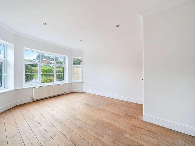 An impressive and immaculately presented family home in a desirable private road