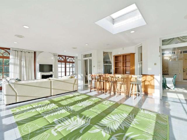 An impressive and imposing country residence set within about 16.21 acres 6.55 hectares of grounds and gardens, with equestrian and leisure facilities and staff/guest accommodation
