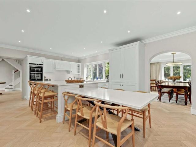 An impressive family home on the prestigious Oxshott Way Estate. With well planned and spacious accommodation, the property also benefits from a south facing garden and outdoor swimming pool