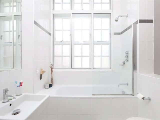 An outstanding two bedroom penthouse apartment with unique views of the City and North London