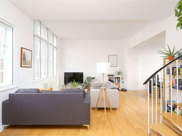 An outstanding two bedroom penthouse apartment with unique views of the City and North London