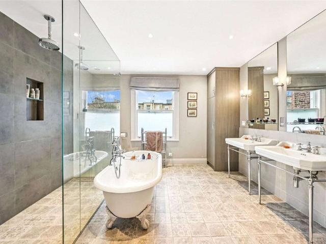 An outstanding end of terrace house with a beautiful garden
