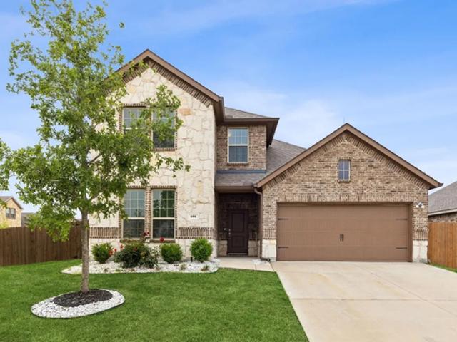As you step through the front door, you're greeted by an inviting atmosphere that permeates every corner of the house.