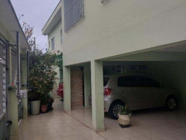 ASSOBRADADA COM 2 CASAS + LOJA 6 VAGAS COBERTAS