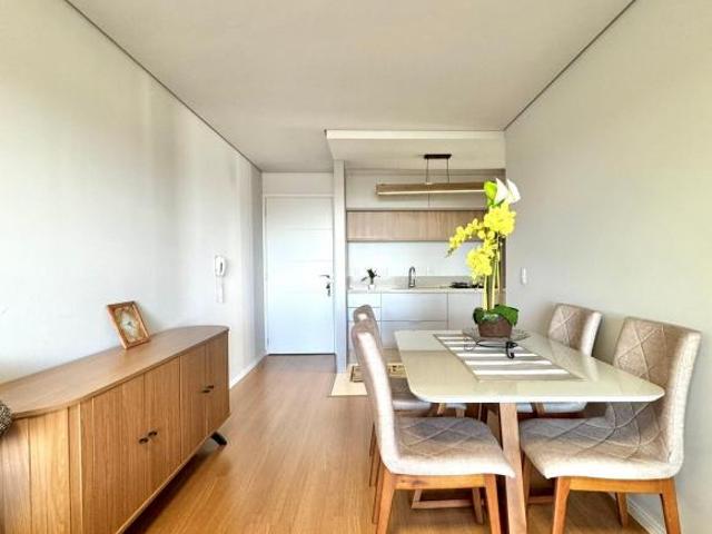 AP571 Apartamento semimobiliado com sacada e churrasqueira
