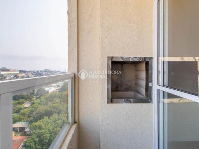 Aparramento com 2 dormitórios sacada e churrasqueira