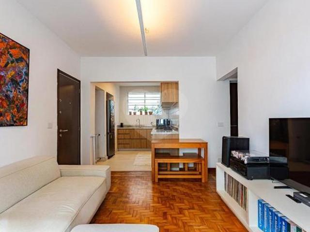 Apartamento 76m² Vila Madalena – 2 quartos, 1 vaga, rooftop, jardim exclusivo, pé direito alto
