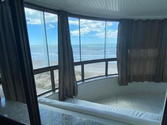 Apartamento 03 dormitórios na beira mar de Tramandaí