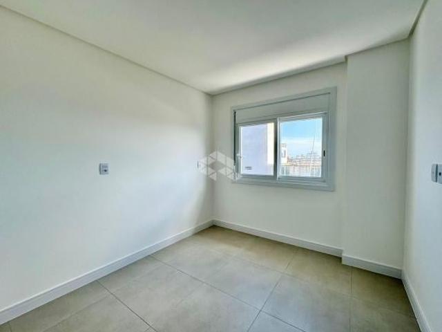 Apartamento 01 dormitório andar alto, vista panorâmixca novo Centro Capão da Canoa