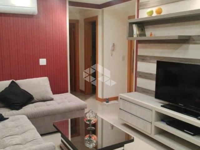 Apartamento 02 dormitórios, 01 suíte, cozinha americana com espaço gourmet, no Bairro Navegantes em