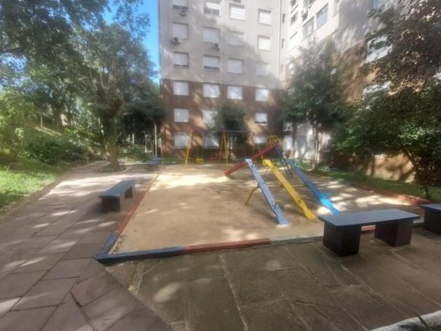 Apartamento 02 dormitórios com cozinha planejada, andar alto de frente na CAMP