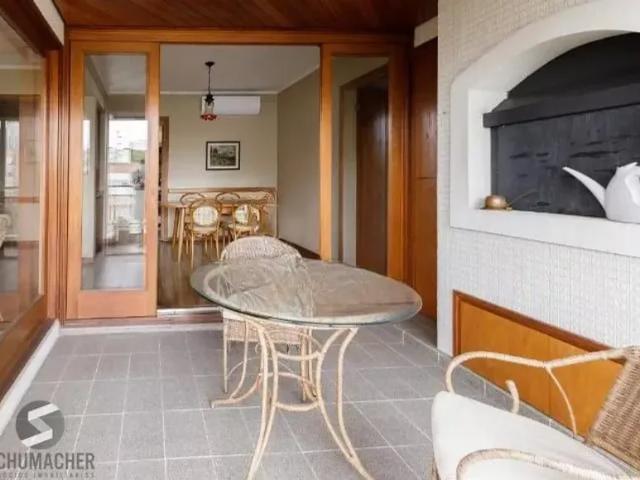 Apartamento 02 dormitórios com churrasqueira e garagem