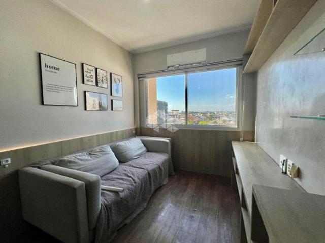 Apartamento 02 dormitórios com suíte, semi mobiliado a venda no Centro