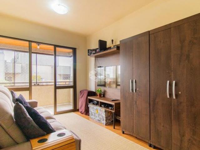 Apartamento 02 dormitórios, garagem e elevador no bairro Menino Deus