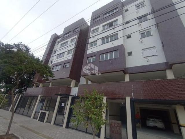 Apartamento 02 dormitórios, suite e duas vagas de garagem