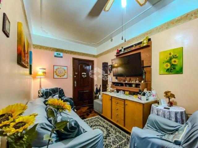 Apartamento 1 dormitório com pátio e vaga de garagem em frente ao Parque da Redenção Porto Alegre