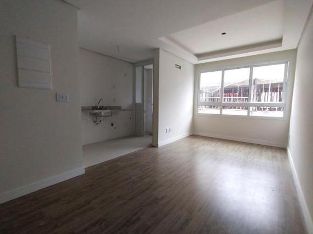 APARTAMENTO 1 DORMITÓRIO COM SUÍTE, COZINHA AMERICANA, LAVABO E AMPLO LIVING NO BOM FIM!