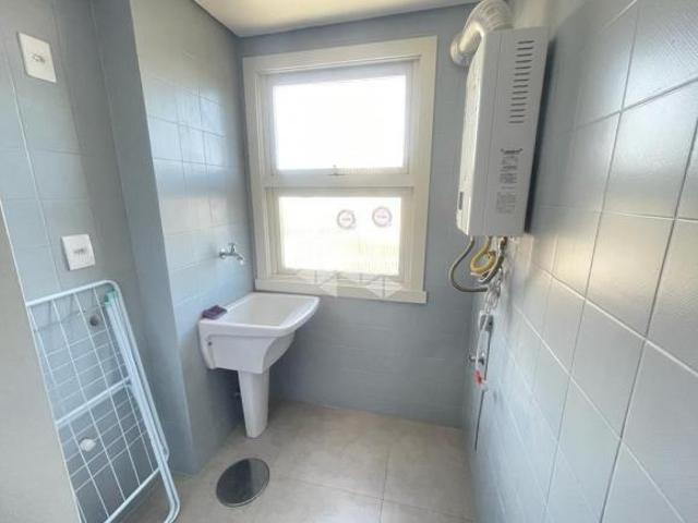 Apartamento 1 dormitório com sacada e garagem para venda no bairro Moinhos de Vento em Porto Alegre