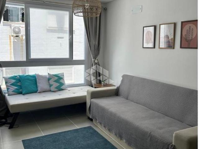 Apartamento 1 dormitório, banho social, churrasqueira, mobiliado com 1 box/vaga de garagem na Zona N