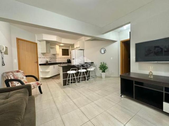 Apartamento 1 dormitório, mobiliado, 1 quadra do mar, 1 box de garagem na Zona N