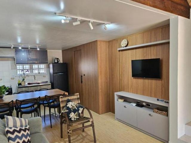 Apartamento 1 Dormitório + Mezanino em Condomínio com Piscina e Garagem em Capão Novo