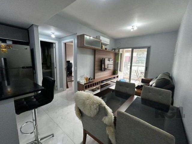 APARTAMENTO, 1 DORMITÓRIO, SACADA COM CHURRASQUEIRA, VAGA DE GARAGEM, BAIRRO PET