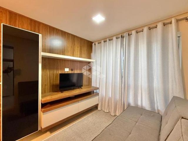 Apartamento 1 dormitório, sendo suíte + banheiro social, mobiliado pronto para uso no bairro Navegan