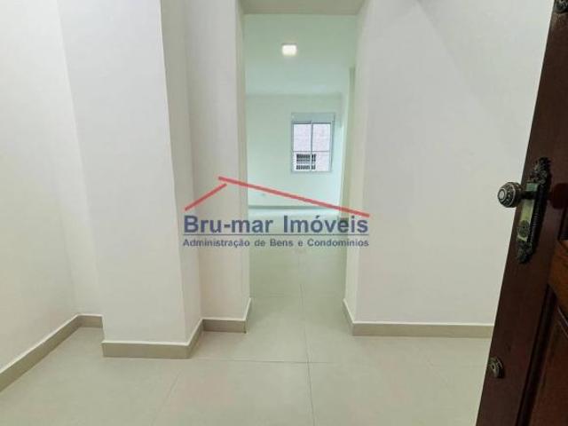 Apartamento 1 dormitório suíte, José Menino, prédio frente mar