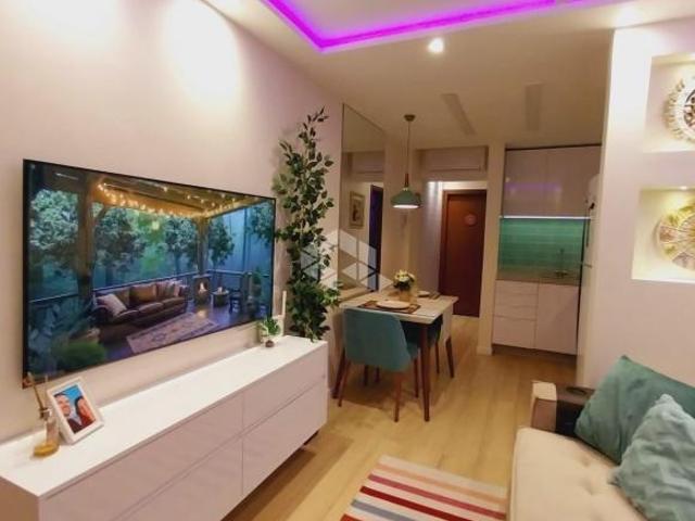 Apartamento 1 dormitórios, mobiliado de frente com garagem no centro de Capão da Canoa