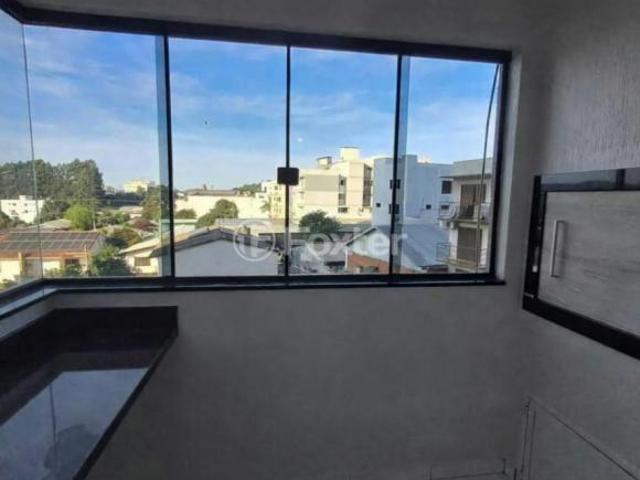 Apartamento, 1 dormitórios, 55.57 m², em Centro
