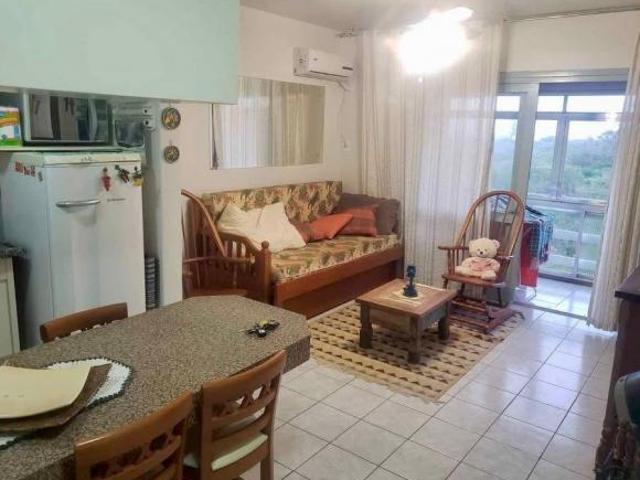 Apartamento 1 quarto com 1 vaga escriturada no condomínio Waikiki Capão Novo, Ca