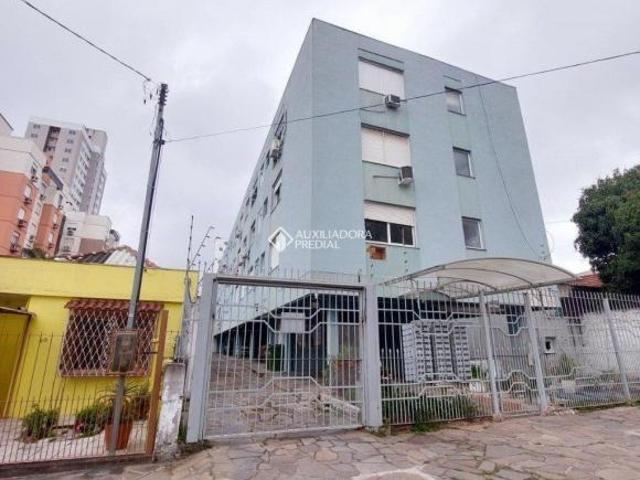 Apartamento 1 um dormitório de frente com garagem próximo a PUC