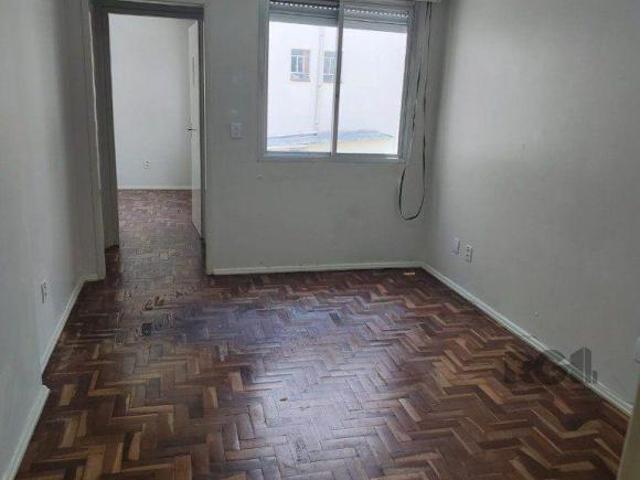 Apartamento 1Dormitório desocupado na Venâncio Aires piso parquêt ensolarado área de serviço ac fina