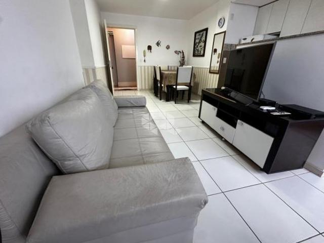 Apartamento 2 dorm. sendo 1 suite, mobiliado no centro de Capão a uma quadra da praia, com vaga
