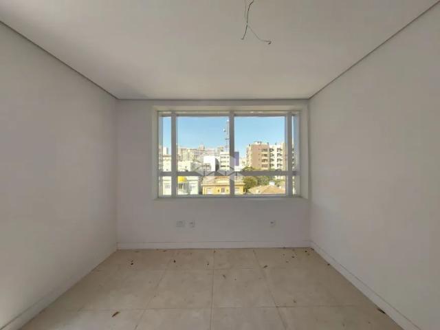 Apartamento 2 dormitórios, suíte, com garagem, no centro