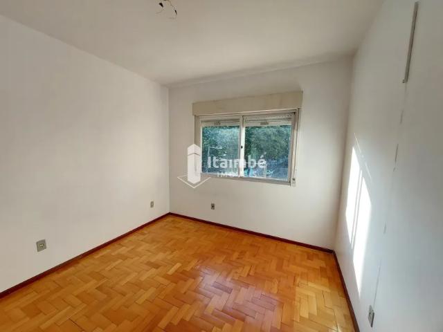 Apartamento 2 dormitórios, sendo 1 suíte, sacada com churrasqueira, vaga de gara