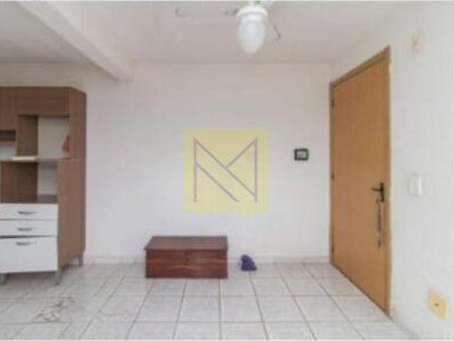 Apartamento 2 dormitórios vaga de garagem rotativa no bairro Camaquã, Porto Alegre/RS