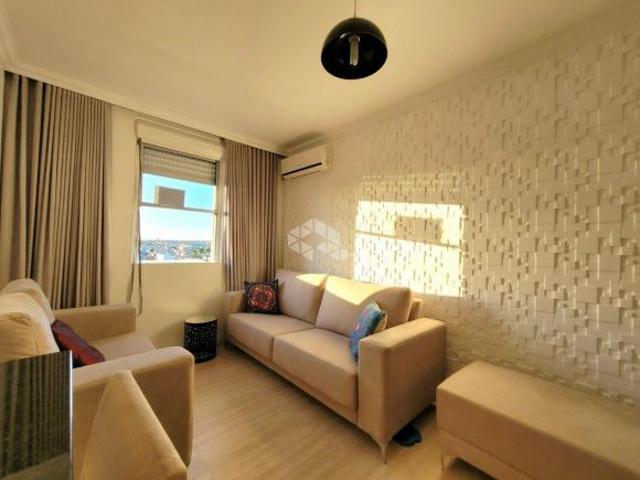 Apartamento 2 Dormitórios mobiliado com o sol da tarde